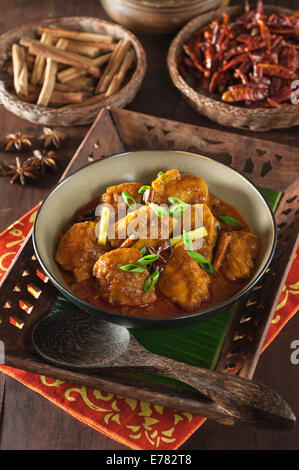 Ayam masak merah is a Malaysia traditional dish. This literally means ...