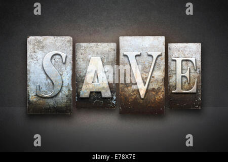 The word SAVE written in vintage ink stained wooden letterpress type in ...
