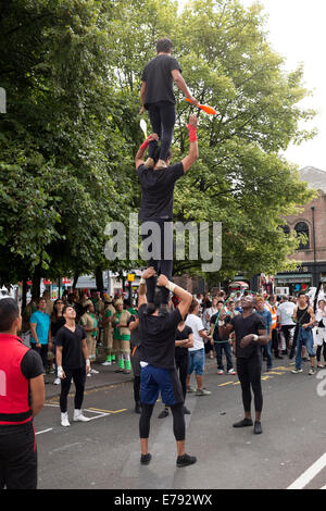 Street Performer Hand Stand Balancing Act Acrobat Stock Photo - Alamy