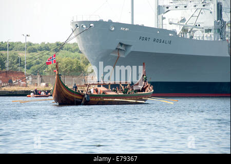 Viking Longboat Next to Royal Navy Huge Ship Stock Photo - Alamy