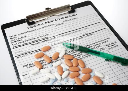 Medical chart ready for writing and pills Stock Photo - Alamy