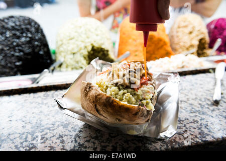 Kumpir- Istanbul style of baked potato stuffed with different fillings ...