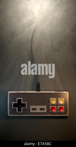 A regular vintage rectangular gaming controller with red and black ...