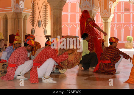 A traditional dance troupe performing in the City Palace of Jaipur, in ...