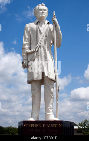 A statue of a historical figure stands proudly on a pedestal ...