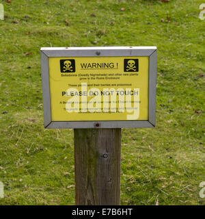 Yellow warning sign for poisonous Deadly Night Shade ( Belladonna ...