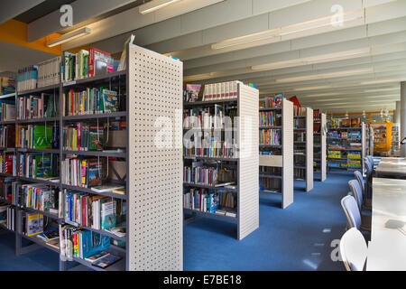 Rows of bookshelves in a library Stock Photo - Alamy