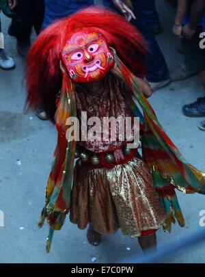 Kathmandu, Nepal. 12th Sep, 2014. A Nepalese devotee performs the ...