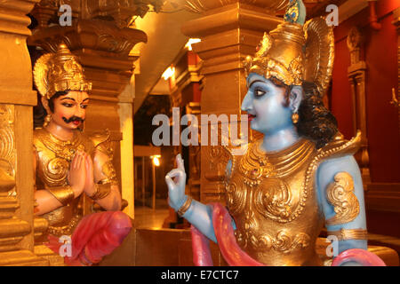 Lord Krishna preaching Bhagavadgita to Arjuna at battlefield in ...