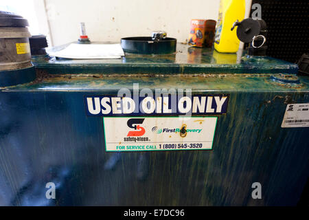 Used motor oil collection tank at auto parts store - USA Stock Photo ...
