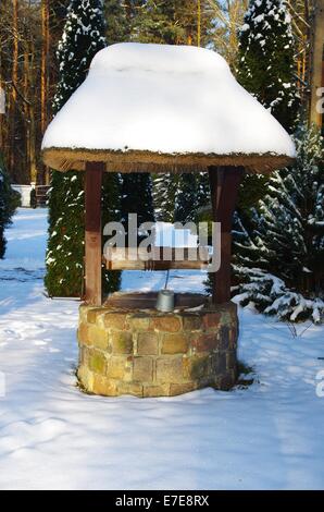 Traditional ancient stone well in japanese garden Stock Photo - Alamy