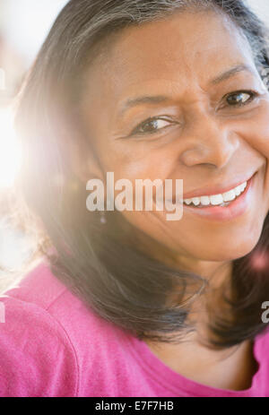 Close up portrait of a natural mixed race woman with curly hair Stock ...
