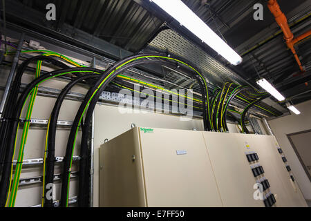 Cabling to electrical control boxes in plant room Stock Photo - Alamy