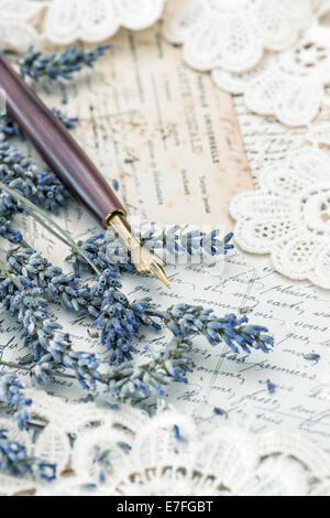 Old letters with dry flowers and book close up Stock Photo - Alamy