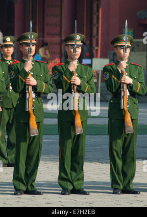 Chinese guard in Tiananmen Square, Beijing. Tiananmen Square is a ...