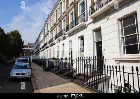 Flat-fronted Victorian terraced houses in Dalston, London England ...