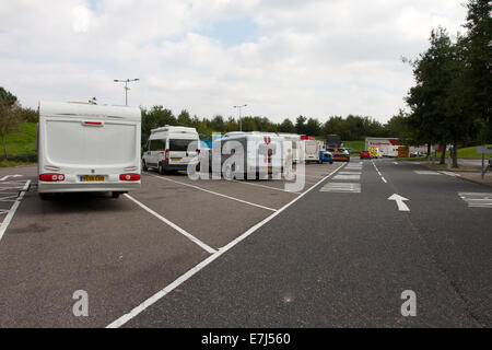 Caravan stop at service station, a couple drinking their teas, UK Stock ...