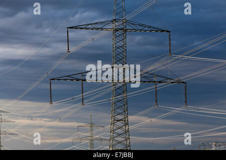 Newly erected high-voltage pylons of the South-West Interconnector of ...