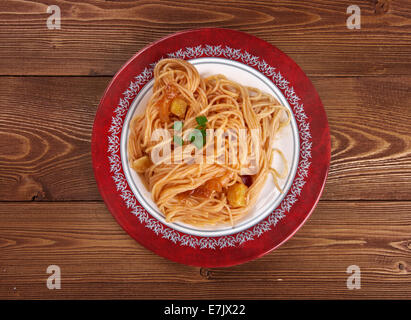Pasta asciutta - pastasciutta cooked pasta is plated and served with a ...