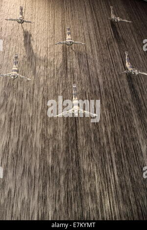Sculptures in waterfall at Dubai Mall in Dubai in United Arab Emirates ...