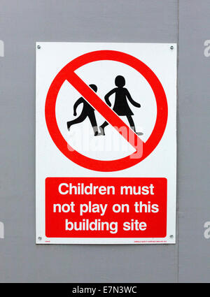 'Children must not play on this site' safety sign attached to a fence ...