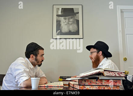 4 religious Jewish students studying Talmud at Lubavitch headquarters ...