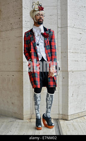 Portrait of a gender ambiguous man in a skirt at Fashion Week 2014 in ...