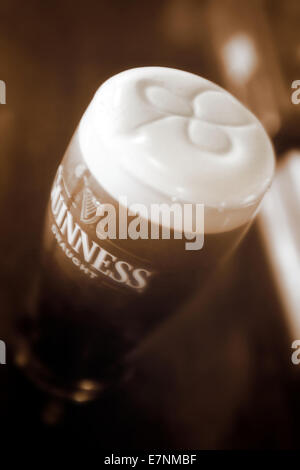 Guinness beer with shamrock in foam Stock Photo - Alamy