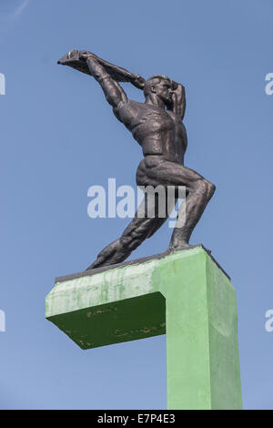 bronze statue of a athletic male body in front of a greek temple Stock ...