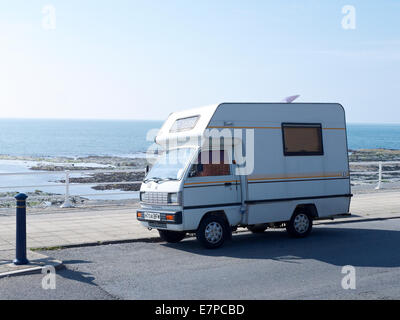 Vauxhall Rascal camper van campervan covered in lots of stickers parked ...