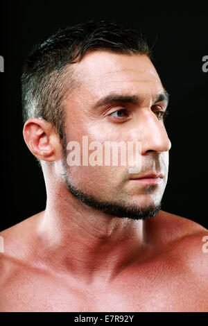 Closeup portrait of handsome thoughtful man posing on white studio ...