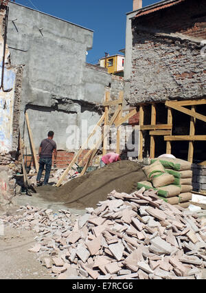 Workers build structure with wooden frames beams bracing in ...