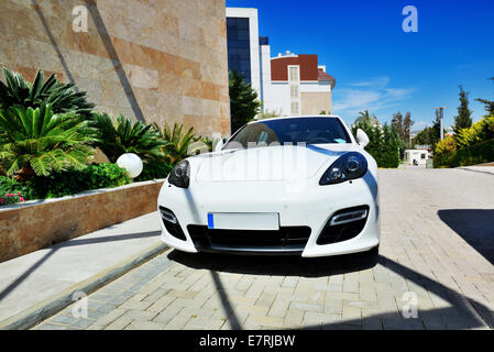 A luxurious car parked near a building in Kolkata, India Stock Photo ...
