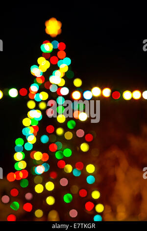 a color unfocused christmas tree at night with stripes Stock Photo - Alamy