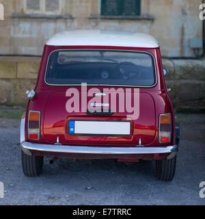 A shiny red Austin 6 car, registration number AXV 227, dating from the ...