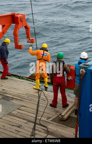 To pick up stones from submarine volcanoes the crew of German research ...