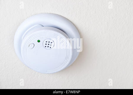 A ceiling mounted fire alarm and smoke detector Stock Photo - Alamy