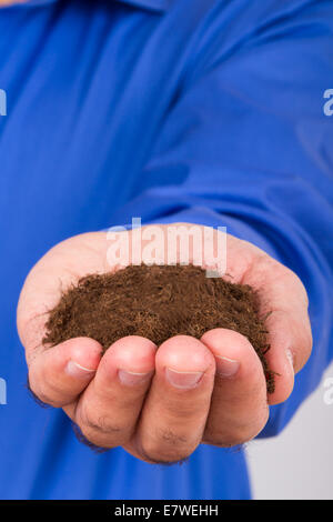 in full growth. businessman with a hand in a welcoming gesture Stock ...