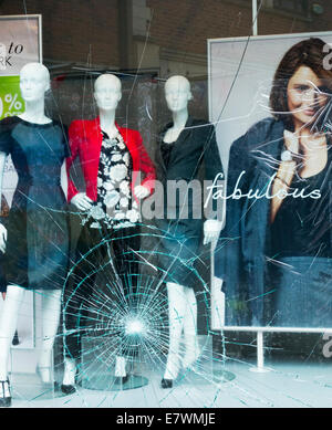 Smashed shop window vandalism Stock Photo - Alamy