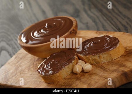 two baguette slices with chocolate hazelnut spread Stock Photo - Alamy