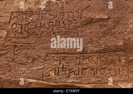 Rock engravings ( petroglyphs ) carved by the Nabataean people in ...