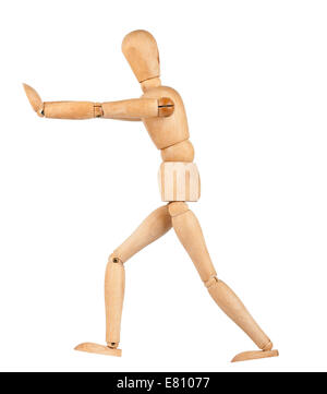 Wooden dummy pushing. Isolated on a white background Stock Photo - Alamy