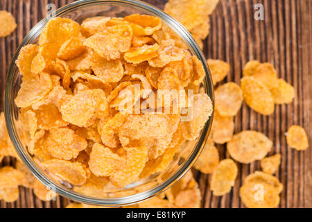 Old wooden table with a portion of Cornflakes Stock Photo - Alamy