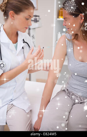 Patient receiving painful injection Stock Photo - Alamy