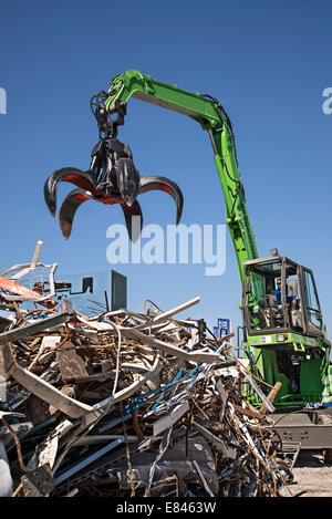 Recycling metal and waste materials at a scrap yard in North London. 3 ...
