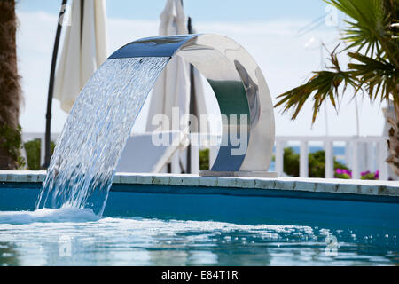 waterfall jet swimming pool Stock Photo - Alamy