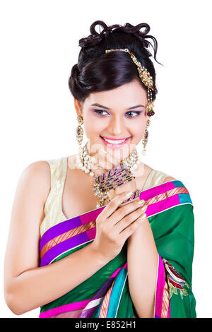 Beautiful Indian girl with stylish earrings wears a yellow dress and ...