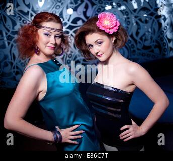 Women or models in club or disco drinking cocktails having fun Stock ...