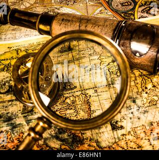 Old compass and magnifying glass lying on the map Stock Photo - Alamy