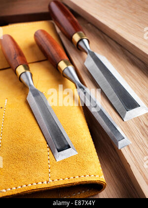 Carpentry tool chisel on a white background with a place under the ...